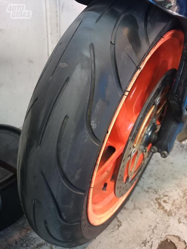 Sarkans Aprilia RSV 2005 Viļņa, ar dzinēja tilpumu 1.00 L un nobraukumu 34 tūkst. km par 2000 €, foto 6 vietnē AUTOMOTO.COM.LV