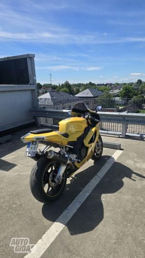 Dzeltens Aprilia RSV 2006 Šauļi, ar dzinēja tilpumu 1.00 L un nobraukumu 26 tūkst. km par 3500 €, foto  vietnē AUTOMOTO.COM.LV