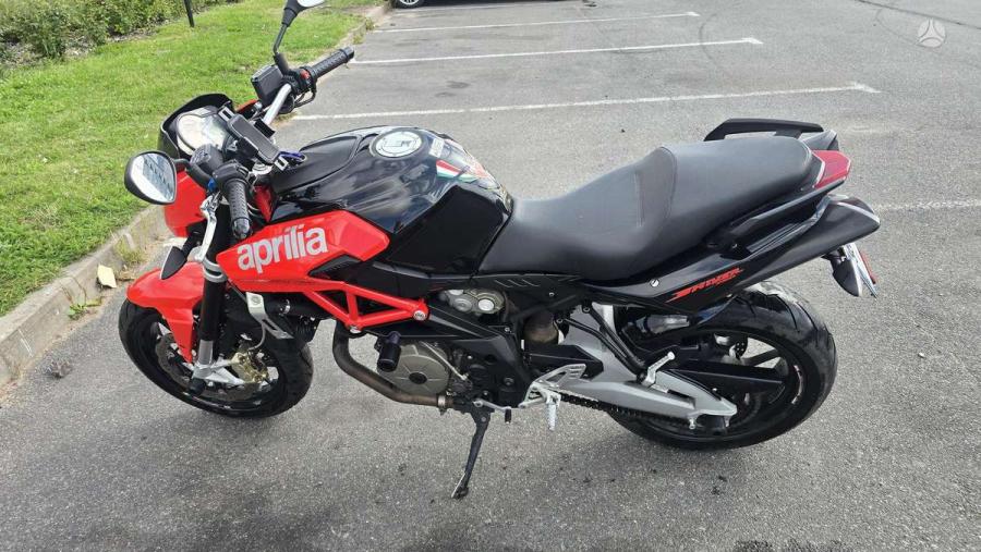 Red Aprilia Shiver 2010 in Vilnius, with an engine capacity of 0.75 L and mileage of 28 thousand km for 3150 €, photo 1 on AUTOMOTO.COM.LV
