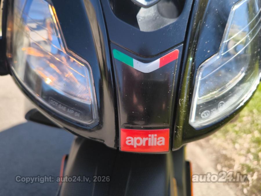 Черный Априлия SR 50R 2014 в Таллин, объемом двигателя 49.00 л и пробегом 29 тыс. км за 1500 €, фото 8 на AUTOMOTO.COM.LV