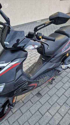 Melns Aprilia SR 2014 Klaipėda, ar dzinēja tilpumu 50.00 L un nobraukumu 18 tūkst. km par 1700 €, foto 9 vietnē AUTOMOTO.COM.LV