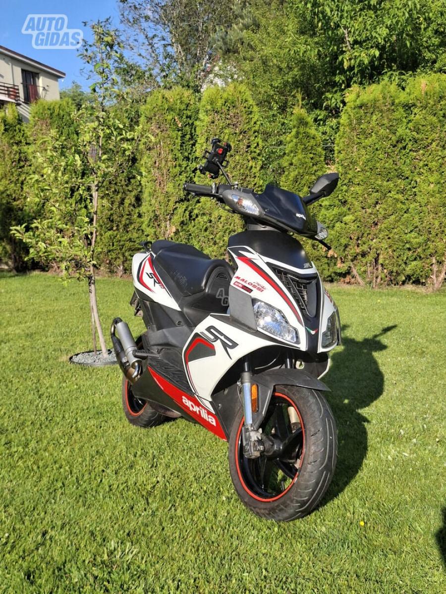 White Aprilia SR 2015 in Vilnius, with an engine capacity of 0.00 L and mileage of 0 thousand km for 1850 €, photo 1 on AUTOMOTO.COM.LV