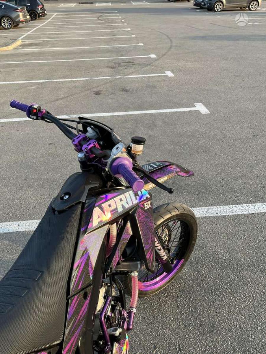 Violets Aprilia SX 2011 Panevēža, ar dzinēja tilpumu 49.00 L un nobraukumu 26 tūkst. km par 2500 €, foto 7 vietnē AUTOMOTO.COM.LV