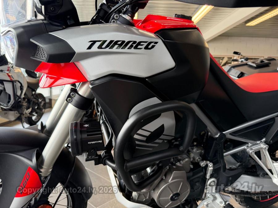 Sarkans Aprilia Tuareg 2022 Tallina, ar dzinēja tilpumu 0.66 L un nobraukumu 25 tūkst. km par 8490 €, foto 19 vietnē AUTOMOTO.COM.LV
