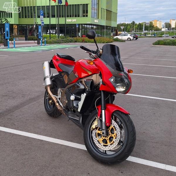 Sarkans Aprilia Tuono 2003 Kauņa, ar dzinēja tilpumu 1.00 L un nobraukumu 57 tūkst. km par 2550 €, foto 2 vietnē AUTOMOTO.COM.LV