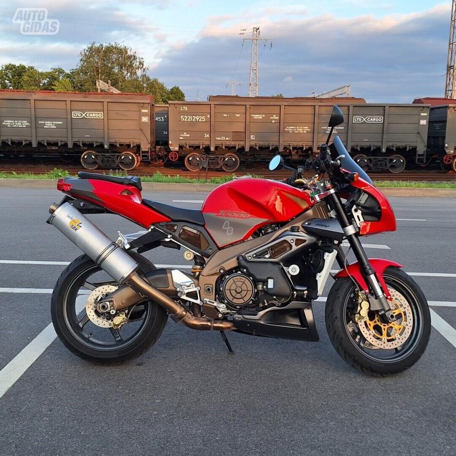 Sarkans Aprilia Tuono 2003 Kauņa, ar dzinēja tilpumu 1.00 L un nobraukumu 57 tūkst. km par 2550 €, foto 6 vietnē AUTOMOTO.COM.LV