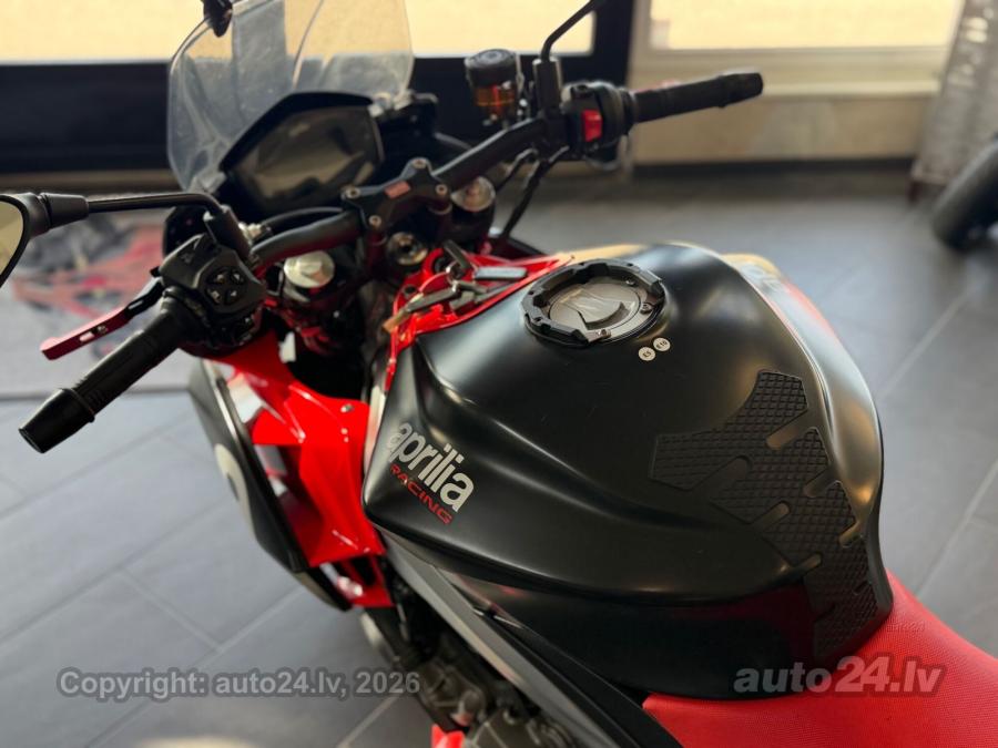 Red Aprilia Tuono 2022 in Tallinn, with an engine capacity of 0.66 L and mileage of 56 thousand km for 4990 €, photo 16 on AUTOMOTO.COM.LV