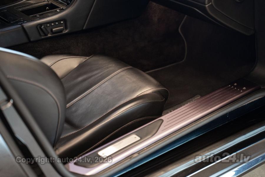 Melns Aston Martin DB9 2009 Tallina, ar dzinēja tilpumu 5.90 L un nobraukumu 46 tūkst. km par 59000 €, foto 17 vietnē AUTOMOTO.COM.LV