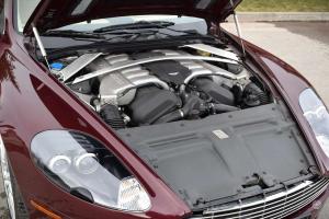 Red Aston Martin DB9 2005 in Klaipeda, with an engine capacity of 5.94 L and mileage of 106 thousand km for 34900 €, photo  on AUTOMOTO.COM.LV