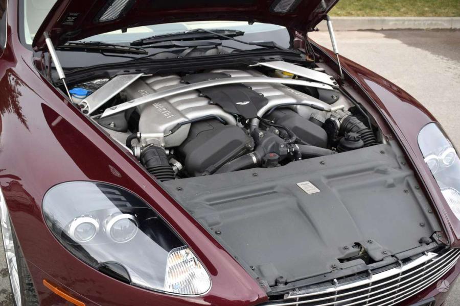 Red Aston Martin DB9 2005 in Klaipeda, with an engine capacity of 5.94 L and mileage of 106 thousand km for 34900 €, photo 1 on AUTOMOTO.COM.LV