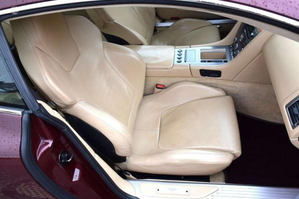 Red Aston Martin DB9 2005 in Klaipeda, with an engine capacity of 5.94 L and mileage of 106 thousand km for 34900 €, photo 9 on AUTOMOTO.COM.LV