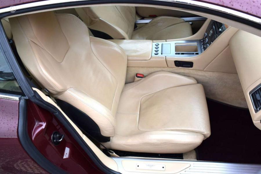 Red Aston Martin DB9 2005 in Klaipeda, with an engine capacity of 5.94 L and mileage of 106 thousand km for 34900 €, photo 10 on AUTOMOTO.COM.LV