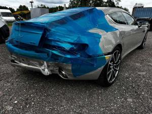 Grey Aston Martin Lagonda 2014 in Vilnius, with an engine capacity of 6.00 L and mileage of 104 thousand km for 35000 €, photo 7 on AUTOMOTO.COM.LV