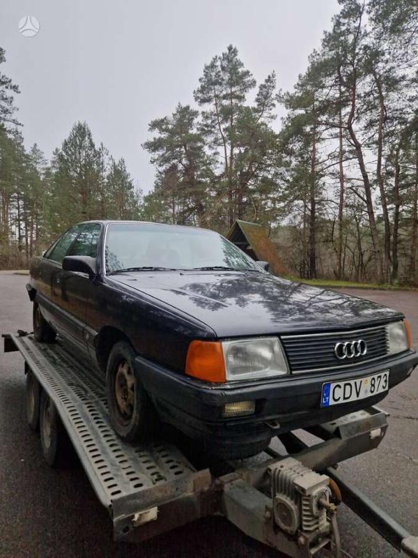 Melns Audi 100 1988 Panevēža, ar dzinēja tilpumu 1.99 L un nobraukumu 246 tūkst. km par 650 €, foto 1 vietnē AUTOMOTO.COM.LV