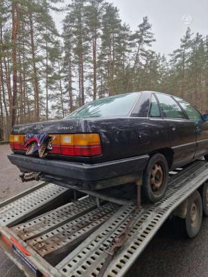 Black Audi 100 1988 in Panevezys, with an engine capacity of 1.99 L and mileage of 246 thousand km for 650 €, photo 2 on AUTOMOTO.COM.LV