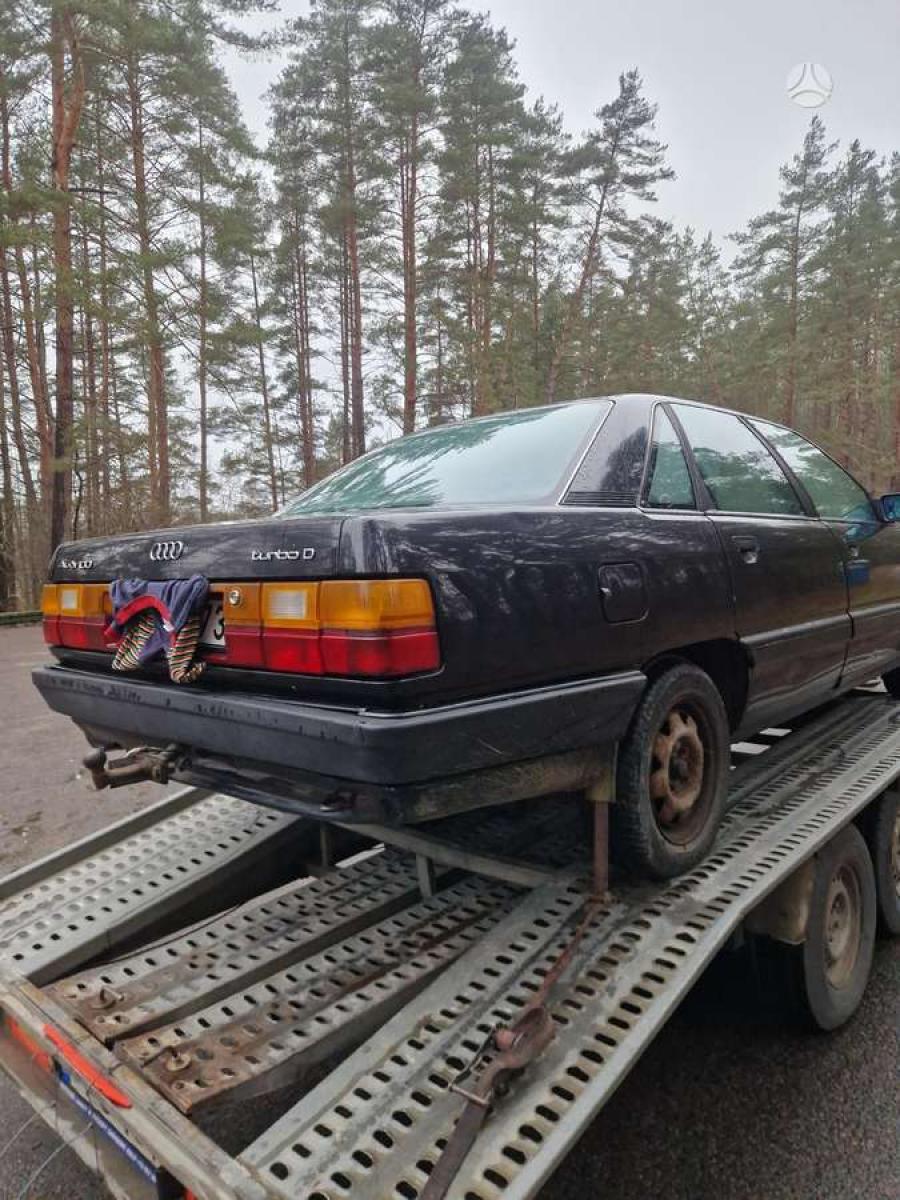 Black Audi 100 1988 in Panevezys, with an engine capacity of 1.99 L and mileage of 246 thousand km for 650 €, photo 2 on AUTOMOTO.COM.LV