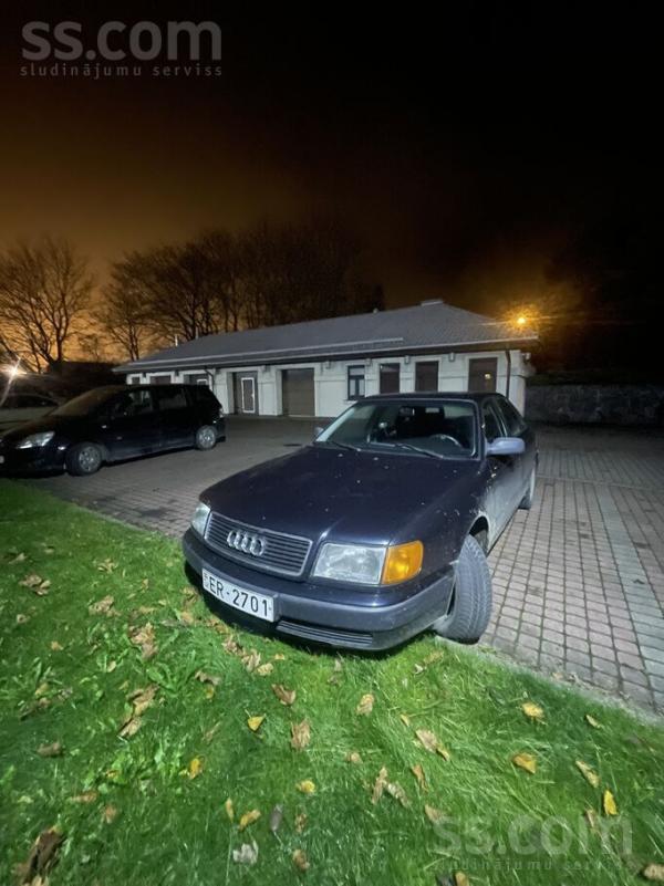 Black Audi 100 1991 in Ventspils, with an engine capacity of 2.00 L and mileage of 209 thousand km for 700 €, photo 1 on AUTOMOTO.COM.LV