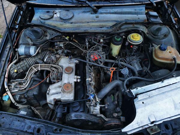 Black Audi 100 1988 in Visaginas, with an engine capacity of 2.30 L and mileage of 256 thousand km for 1000 €, photo 3 on AUTOMOTO.COM.LV