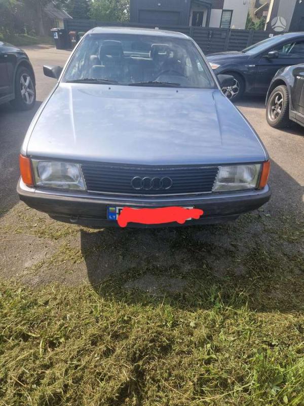Grey Audi 100 1984 in Klaipeda, with an engine capacity of 1.78 L and mileage of 260 thousand km for 950 €, photo 1 on AUTOMOTO.COM.LV