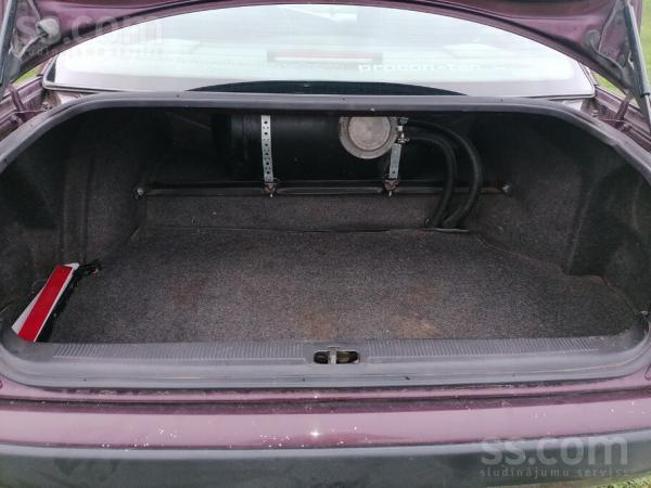 Sarkans Audi 100 1992 Valmiera, ar dzinēja tilpumu 2.30 L un nobraukumu 320 tūkst. km par 1000 €, foto 7 vietnē AUTOMOTO.COM.LV
