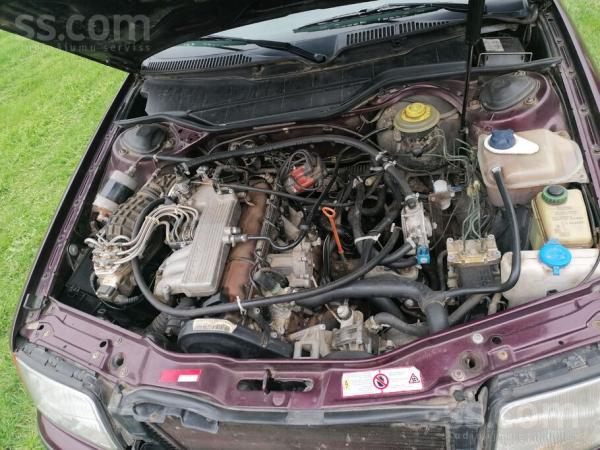 Sarkans Audi 100 1992 Valmiera, ar dzinēja tilpumu 2.30 L un nobraukumu 320 tūkst. km par 1000 €, foto 8 vietnē AUTOMOTO.COM.LV