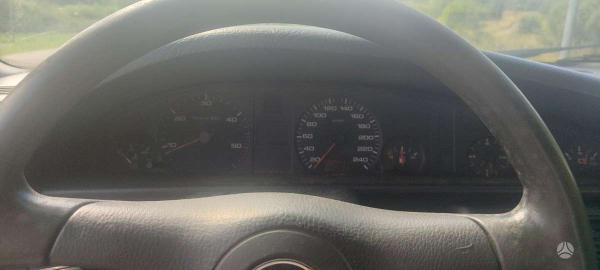 Red Audi 100 1993 in Vilnius, with an engine capacity of 2.46 L and mileage of 324 thousand km for 750 €, photo 8 on AUTOMOTO.COM.LV