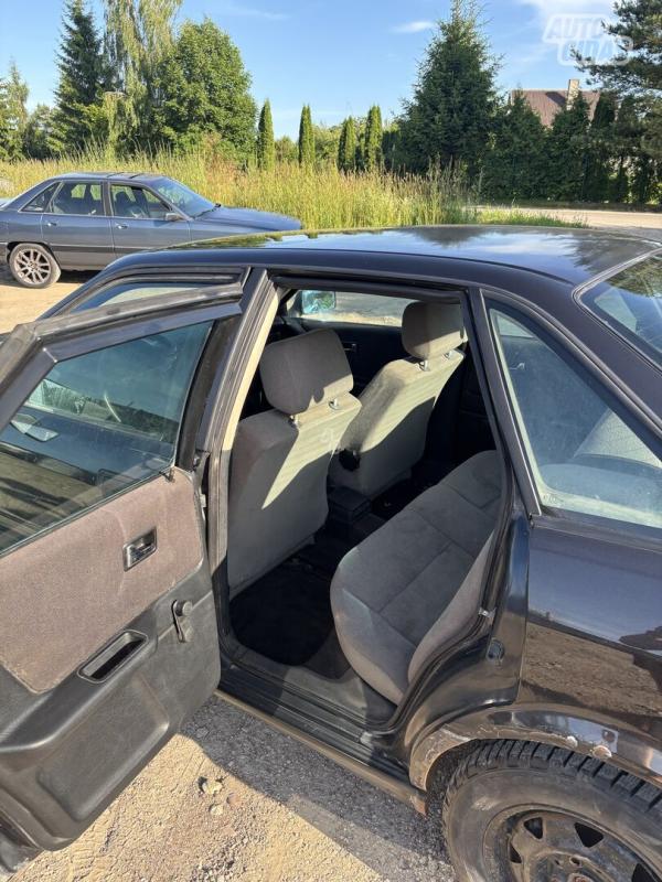 Black Audi 80 1989 in Mazeikiai, with an engine capacity of 2.00 L and mileage of 250 thousand km for 900 €, photo 8 on AUTOMOTO.COM.LV
