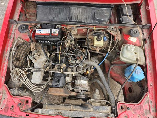 Red Audi 80 1986 in Rokiskis, with an engine capacity of 1.78 L and mileage of 254 thousand km for 2500 €, photo 11 on AUTOMOTO.COM.LV