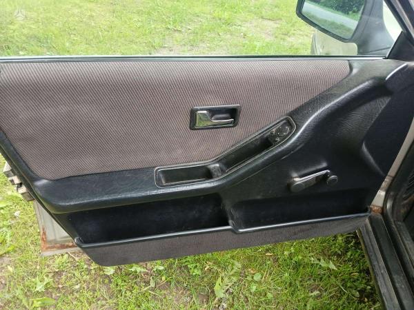Brown Audi 90 1987 in Vilnius, with an engine capacity of 1.99 L and mileage of 250 thousand km for 750 €, photo 9 on AUTOMOTO.COM.LV
