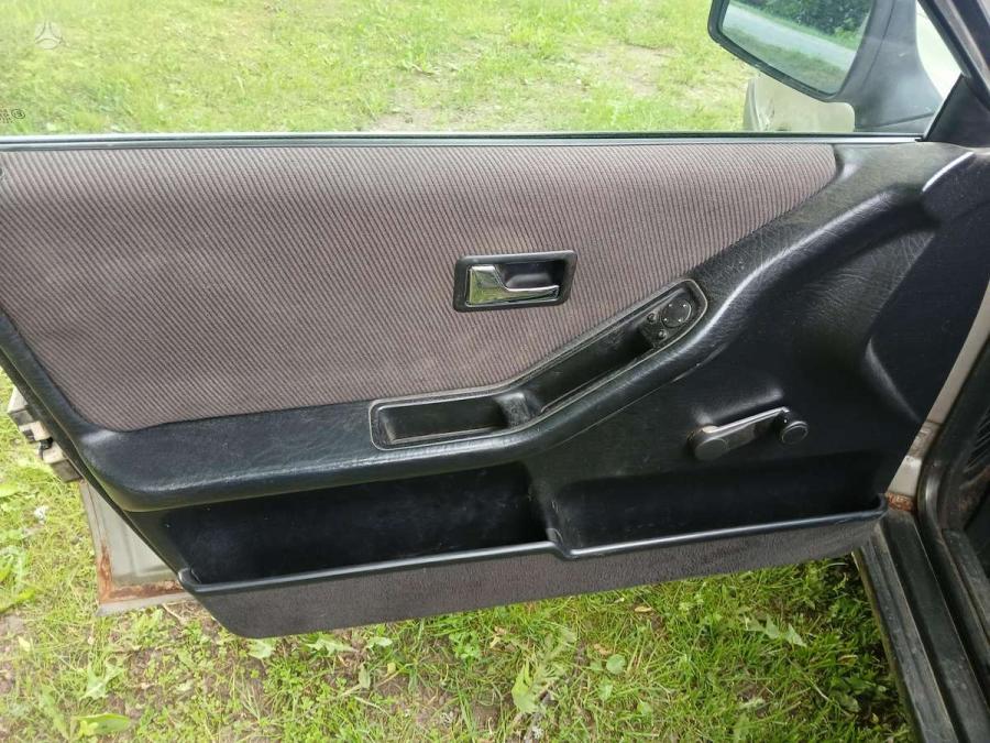 Brown Audi 90 1987 in Vilnius, with an engine capacity of 1.99 L and mileage of 250 thousand km for 750 €, photo 10 on AUTOMOTO.COM.LV