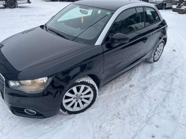 Black Audi A1 2010 in Vilnius, with an engine capacity of 1.39 L and mileage of 214 thousand km for 3850 €, photo 1 on AUTOMOTO.COM.LV