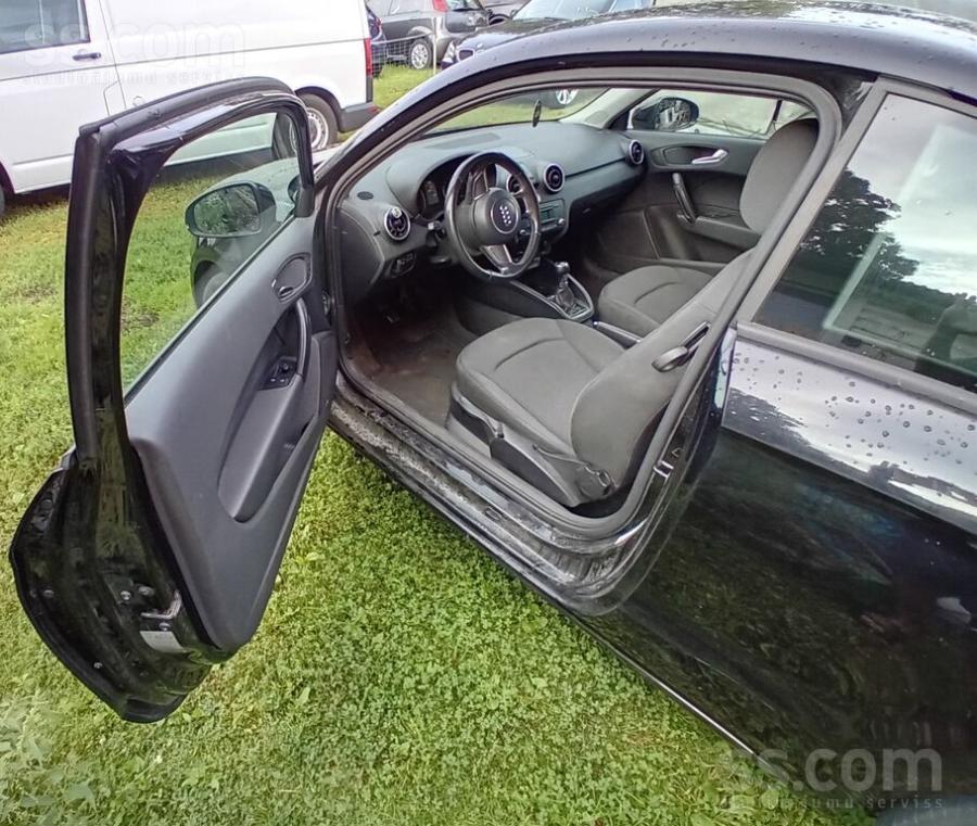 Black Audi A1 2011 in Riga, with an engine capacity of 1.20 L and mileage of 345 thousand km for 2992 €, photo 8 on AUTOMOTO.COM.LV