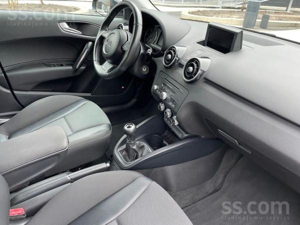Black Audi A1 2013 in Riga, with an engine capacity of 1.60 L and mileage of 213 thousand km for 6650 €, photo 8 on AUTOMOTO.COM.LV