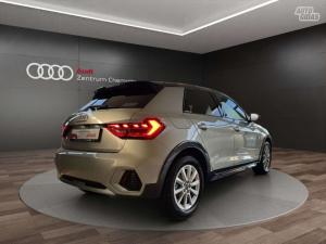 Grey Audi A1 2024 in Kaunas, with an engine capacity of 1.00 L and mileage of 10 thousand km for 27540 €, photo 3 on AUTOMOTO.COM.LV
