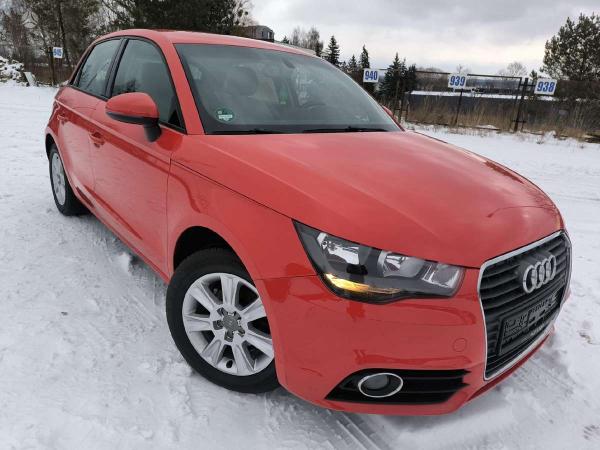 Red Audi A1 2013 in Alytus, with an engine capacity of 1.20 L and mileage of 163 thousand km for 5400 €, photo 1 on AUTOMOTO.COM.LV