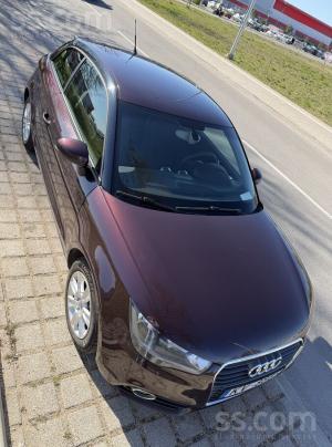 Red Audi A1 2013 in Riga, with an engine capacity of 1.60 L and mileage of 213 thousand km for 5900 €, photo  on AUTOMOTO.COM.LV