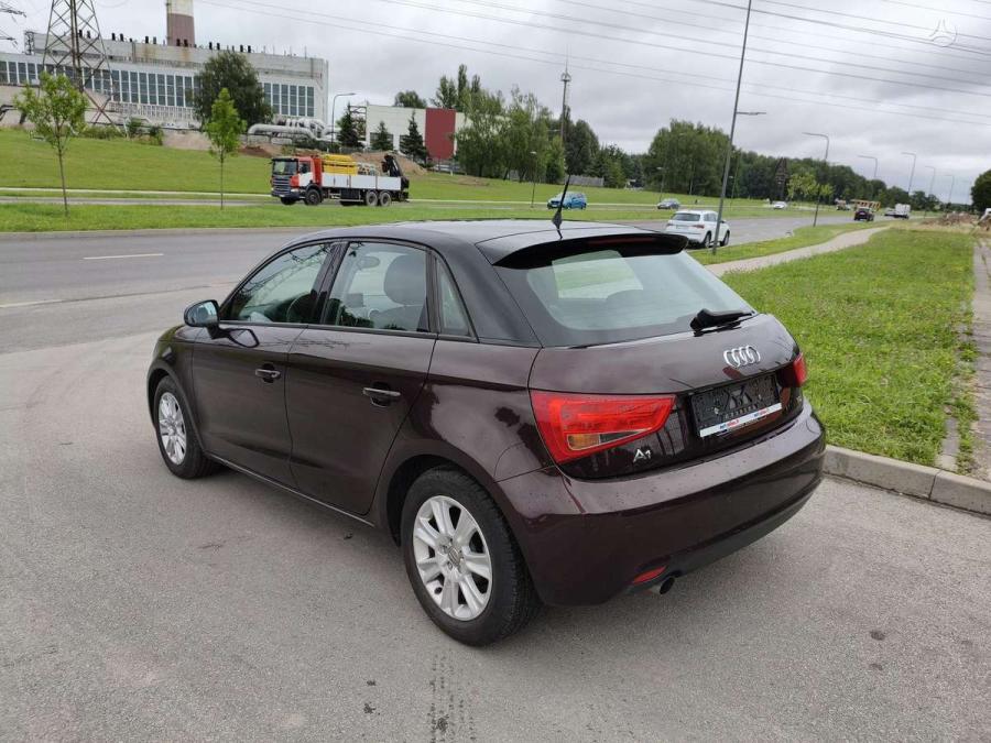 Red Audi A1 2013 in Kaunas, with an engine capacity of 1.60 L and mileage of 187 thousand km for 6900 €, photo 8 on AUTOMOTO.COM.LV