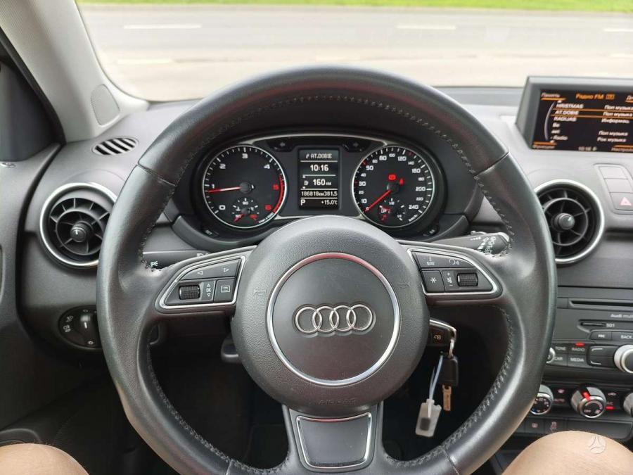 Red Audi A1 2013 in Kaunas, with an engine capacity of 1.60 L and mileage of 187 thousand km for 6900 €, photo 11 on AUTOMOTO.COM.LV
