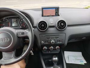 Red Audi A1 2013 in Kaunas, with an engine capacity of 1.60 L and mileage of 187 thousand km for 6900 €, photo 15 on AUTOMOTO.COM.LV