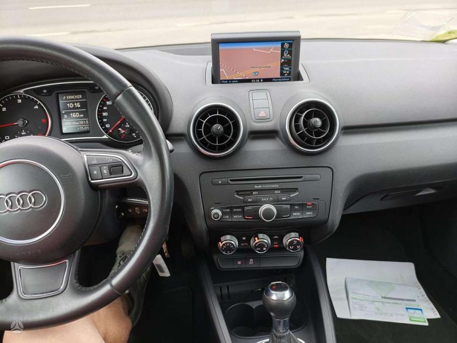 Red Audi A1 2013 in Kaunas, with an engine capacity of 1.60 L and mileage of 187 thousand km for 6900 €, photo 15 on AUTOMOTO.COM.LV