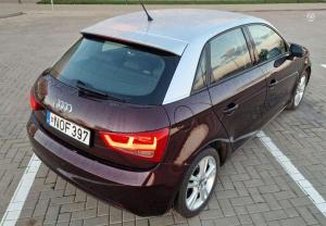 Red Audi A1 2014 in Kaunas, with an engine capacity of 1.20 L and mileage of 227 thousand km for 4750 €, photo 8 on AUTOMOTO.COM.LV