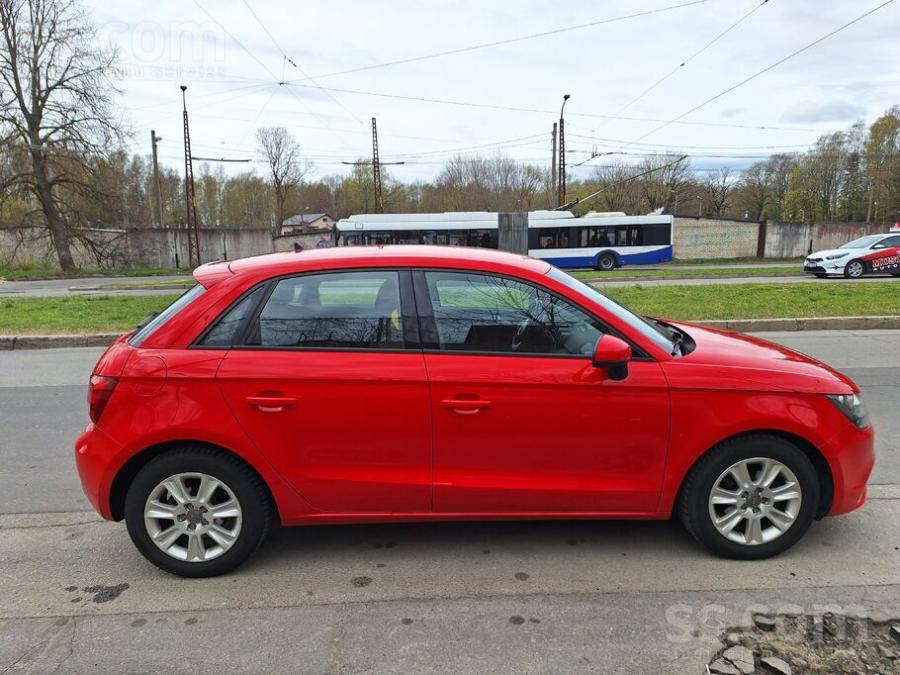 Red Audi A1 2014 in Riga, with an engine capacity of 1.60 L and mileage of 216 thousand km for 4850 €, photo 3 on AUTOMOTO.COM.LV