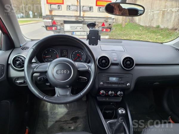 Red Audi A1 2014 in Riga, with an engine capacity of 1.60 L and mileage of 216 thousand km for 4850 €, photo 5 on AUTOMOTO.COM.LV