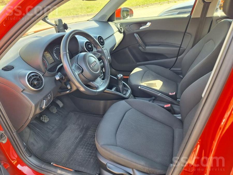 Red Audi A1 2014 in Riga, with an engine capacity of 1.60 L and mileage of 216 thousand km for 4599 €, photo 8 on AUTOMOTO.COM.LV