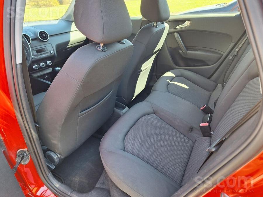 Red Audi A1 2014 in Riga, with an engine capacity of 1.60 L and mileage of 216 thousand km for 4599 €, photo 9 on AUTOMOTO.COM.LV