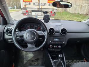 Red Audi A1 2014 in Riga, with an engine capacity of 1.60 L and mileage of 216 thousand km for 4599 €, photo 10 on AUTOMOTO.COM.LV