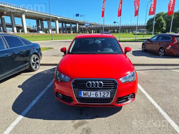Red Audi A1 2014 in Riga, with an engine capacity of 1.60 L and mileage of 218 thousand km for 4850 €, photo 3 on AUTOMOTO.COM.LV