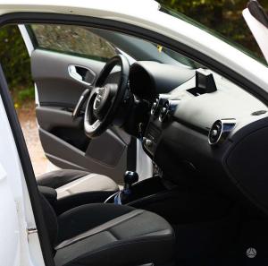 White Audi A1 2013 in Kretinga, with an engine capacity of 1.60 L and mileage of 275 thousand km for 6499 €, photo 32 on AUTOMOTO.COM.LV