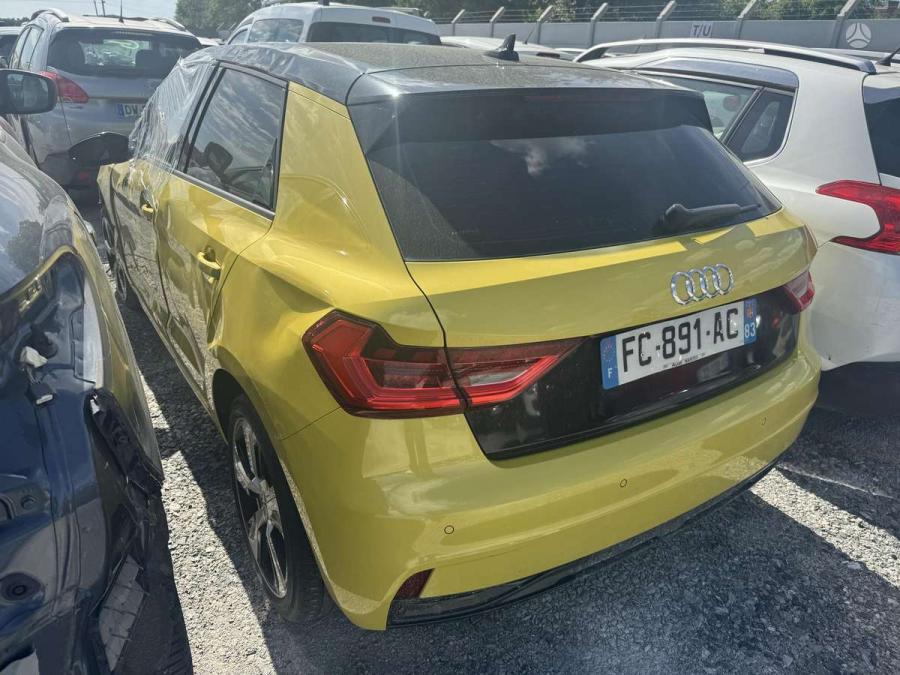 Yellow Audi A1 2018 in Taurage, with an engine capacity of 1.00 L and mileage of 104 thousand km for 6900 €, photo 5 on AUTOMOTO.COM.LV
