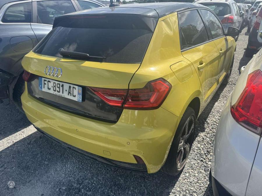 Yellow Audi A1 2018 in Taurage, with an engine capacity of 1.00 L and mileage of 104 thousand km for 6900 €, photo 6 on AUTOMOTO.COM.LV